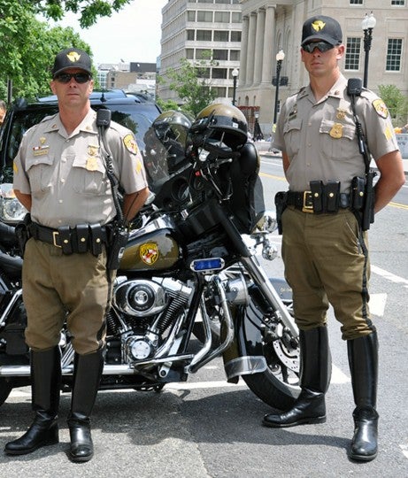 Cops in boots by dajohnson | BeFunky Photo Editor