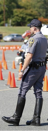 Cop in boots by dajohnson | BeFunky Photo Editor